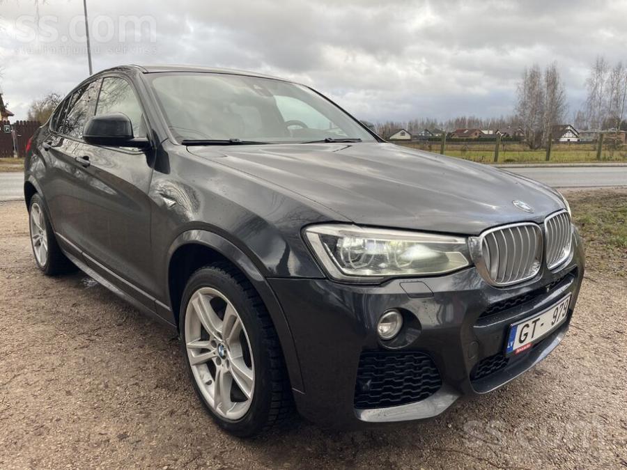 Black BMW X4 2014 in Riga, with an engine capacity of 3.00 L and mileage of 257 thousand km for 14990 €, photo 8 on AUTOMOTO.COM.LV