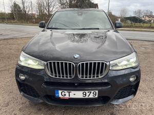 Black BMW X4 2014 in Riga, with an engine capacity of 3.00 L and mileage of 257 thousand km for 14990 €, photo 9 on AUTOMOTO.COM.LV