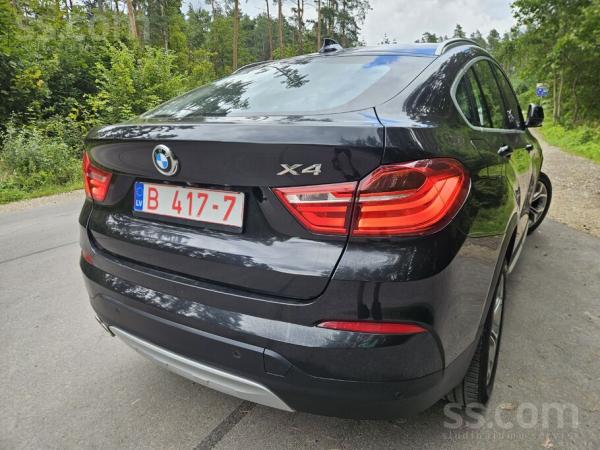 Black BMW X4 2014 in Riga, with an engine capacity of 3.00 L and mileage of 260 thousand km for 14950 €, photo 5 on AUTOMOTO.COM.LV