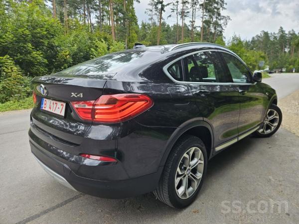 Black BMW X4 2014 in Riga, with an engine capacity of 3.00 L and mileage of 260 thousand km for 14950 €, photo 6 on AUTOMOTO.COM.LV