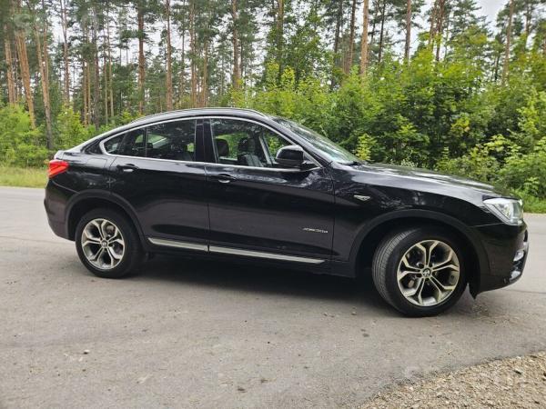Black BMW X4 2014 in Riga, with an engine capacity of 3.00 L and mileage of 260 thousand km for 14950 €, photo 10 on AUTOMOTO.COM.LV