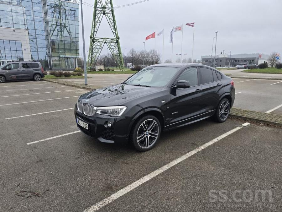 Black BMW X4 2015 in Riga, with an engine capacity of 3.00 L and mileage of 289 thousand km for 19500 €, photo 1 on AUTOMOTO.COM.LV
