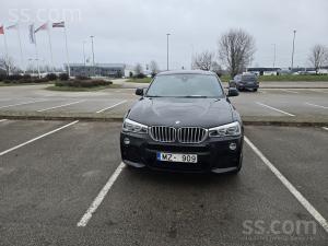 Black BMW X4 2015 in Riga, with an engine capacity of 3.00 L and mileage of 289 thousand km for 19500 €, photo 2 on AUTOMOTO.COM.LV
