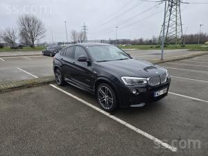 Black BMW X4 2015 in Riga, with an engine capacity of 3.00 L and mileage of 289 thousand km for 19500 €, photo 3 on AUTOMOTO.COM.LV