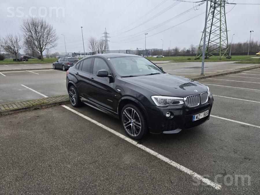 Black BMW X4 2015 in Riga, with an engine capacity of 3.00 L and mileage of 289 thousand km for 19500 €, photo 3 on AUTOMOTO.COM.LV