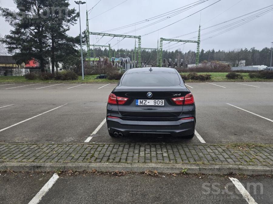 Black BMW X4 2015 in Riga, with an engine capacity of 3.00 L and mileage of 289 thousand km for 19500 €, photo 5 on AUTOMOTO.COM.LV