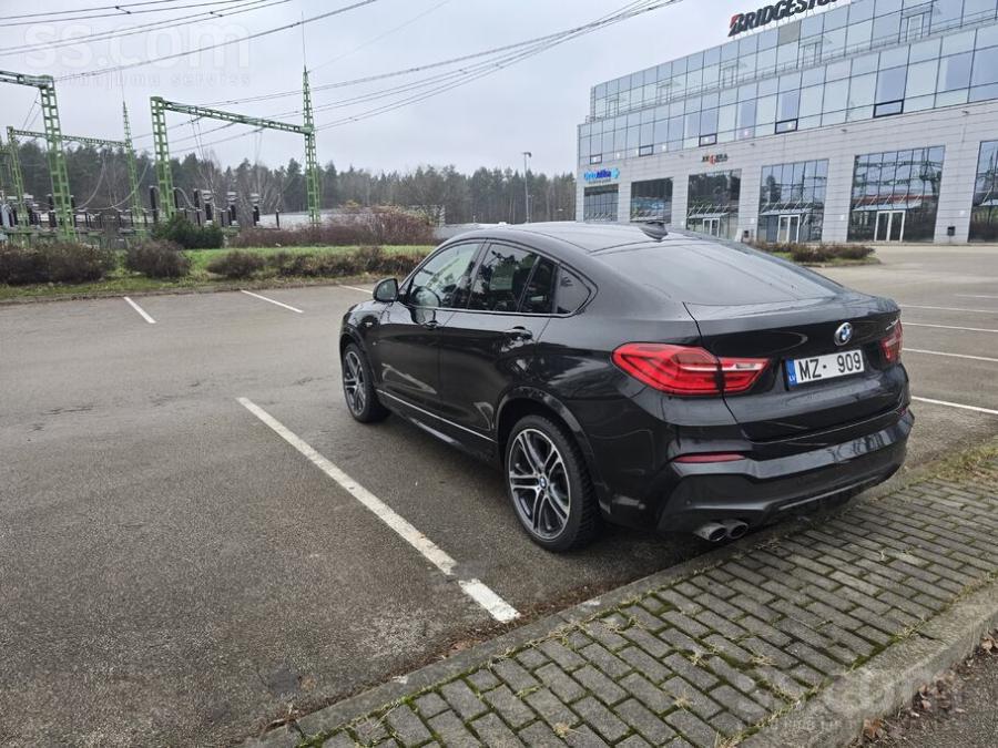 Black BMW X4 2015 in Riga, with an engine capacity of 3.00 L and mileage of 289 thousand km for 19500 €, photo 6 on AUTOMOTO.COM.LV