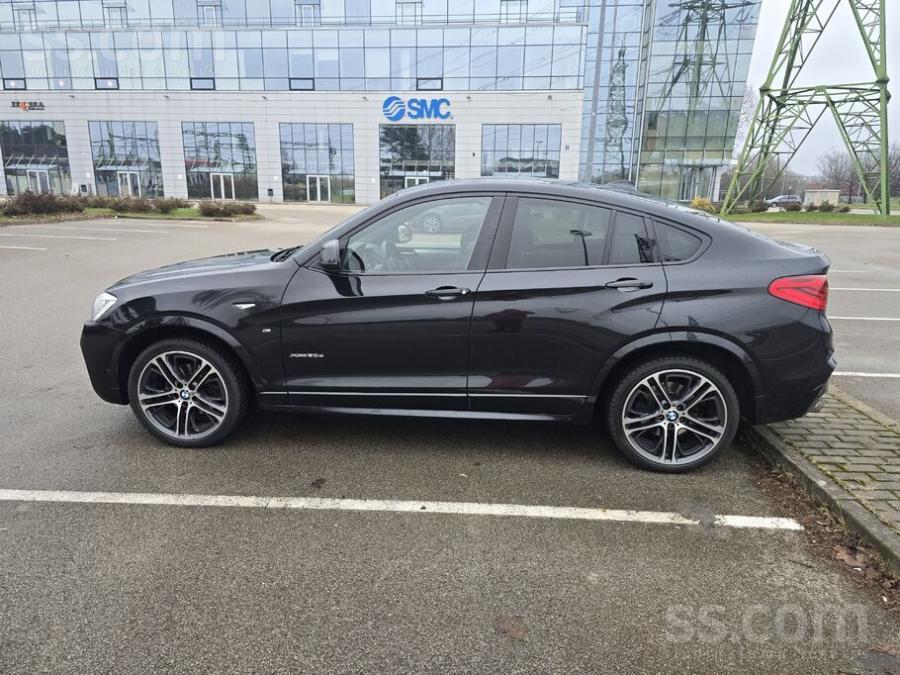 Black BMW X4 2015 in Riga, with an engine capacity of 3.00 L and mileage of 289 thousand km for 19500 €, photo 7 on AUTOMOTO.COM.LV