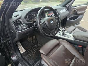Black BMW X4 2015 in Riga, with an engine capacity of 3.00 L and mileage of 289 thousand km for 19500 €, photo 8 on AUTOMOTO.COM.LV
