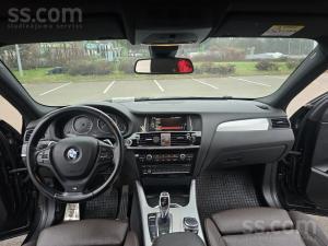 Black BMW X4 2015 in Riga, with an engine capacity of 3.00 L and mileage of 289 thousand km for 19500 €, photo 9 on AUTOMOTO.COM.LV