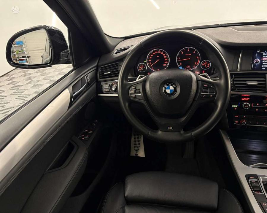 Black BMW X4 2015 in Marijampole, with an engine capacity of 2.99 L and mileage of 232 thousand km for 16999 €, photo 14 on AUTOMOTO.COM.LV