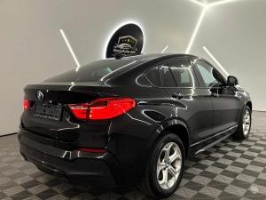 Black BMW X4 2015 in Marijampole, with an engine capacity of 2.99 L and mileage of 232 thousand km for 16999 €, photo 25 on AUTOMOTO.COM.LV