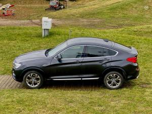 Black BMW X4 2015 in Vilnius, with an engine capacity of 2.99 L and mileage of 102 thousand km for 16000 €, photo 4 on AUTOMOTO.COM.LV