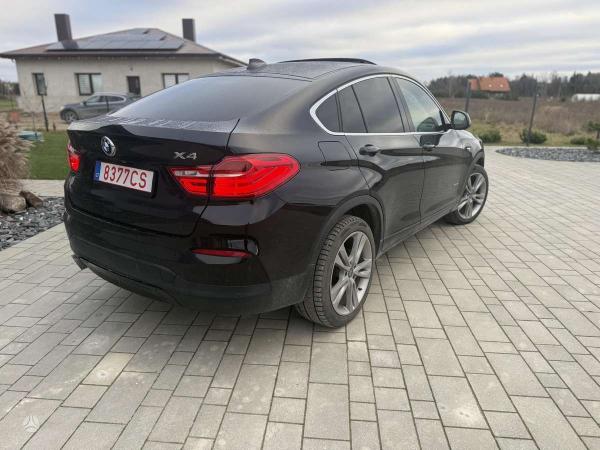 Black BMW X4 2015 in Klaipeda, with an engine capacity of 2.00 L and mileage of 189 thousand km for 16000 €, photo 6 on AUTOMOTO.COM.LV