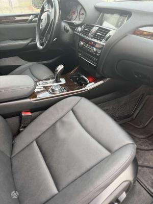 Black BMW X4 2015 in Klaipeda, with an engine capacity of 2.00 L and mileage of 189 thousand km for 16000 €, photo 12 on AUTOMOTO.COM.LV