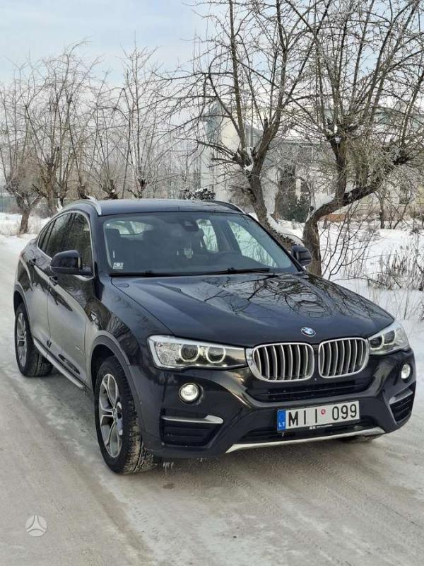Black BMW X4 2015 in Panevezys, with an engine capacity of 2.00 L and mileage of 248 thousand km for 17300 €, photo 1 on AUTOMOTO.COM.LV
