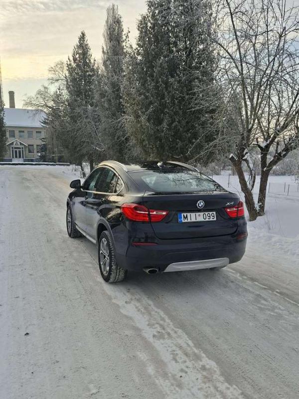 Black BMW X4 2015 in Panevezys, with an engine capacity of 2.00 L and mileage of 248 thousand km for 17300 €, photo 7 on AUTOMOTO.COM.LV