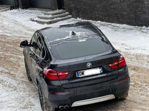 Black BMW X4 2015 in Vilnius, with an engine capacity of 2.99 L and mileage of 100 thousand km for 16999 €, photo 4 on AUTOMOTO.COM.LV