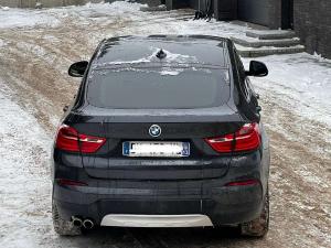 Black BMW X4 2015 in Vilnius, with an engine capacity of 2.99 L and mileage of 100 thousand km for 16999 €, photo 5 on AUTOMOTO.COM.LV