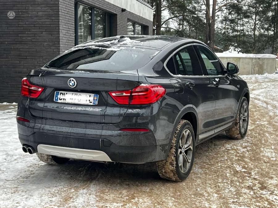 Black BMW X4 2015 in Vilnius, with an engine capacity of 2.99 L and mileage of 100 thousand km for 16999 €, photo 6 on AUTOMOTO.COM.LV