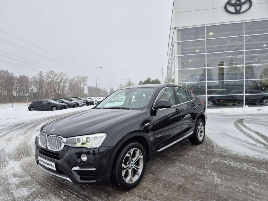 Black BMW X4 2015 in Panevezys, with an engine capacity of 2.00 L and mileage of 198 thousand km for 15750 €, photo 1 on AUTOMOTO.COM.LV