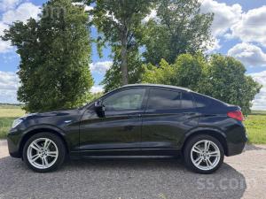 Black BMW X4 2015 in Ogre, with an engine capacity of 2.00 L and mileage of 255 thousand km for 16200 €, photo  on AUTOMOTO.COM.LV