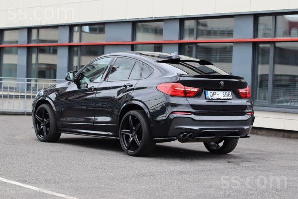 Black BMW X4 2015 in Riga, with an engine capacity of 3.00 L and mileage of 160 thousand km for 18980 €, photo 4 on AUTOMOTO.COM.LV