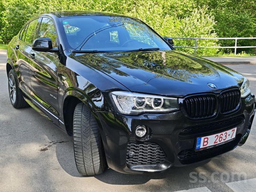 Black BMW X4 2015 in Ogre, with an engine capacity of 3.00 L and mileage of 0 thousand km for 15999 €, photo 4 on AUTOMOTO.COM.LV