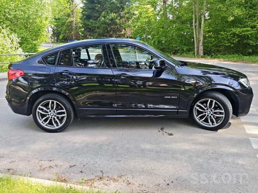 Black BMW X4 2015 in Ogre, with an engine capacity of 3.00 L and mileage of 0 thousand km for 15999 €, photo 5 on AUTOMOTO.COM.LV