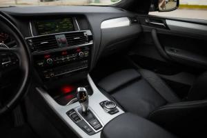 Black BMW X4 2015 in Jelgava, with an engine capacity of 2.00 L and mileage of 240 thousand km for 20950 €, photo 11 on AUTOMOTO.COM.LV