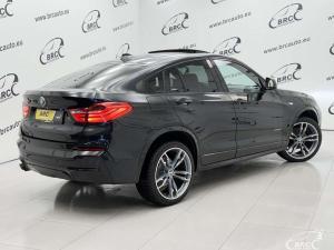 Black BMW X4 2015 in Vilnius, with an engine capacity of 2.00 L and mileage of 206 thousand km for 10900 €, photo 4 on AUTOMOTO.COM.LV