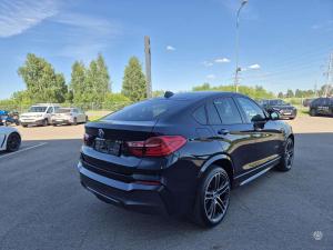 Black BMW X4 2015 in Panevezys, with an engine capacity of 2.00 L and mileage of 401 thousand km for 12650 €, photo 6 on AUTOMOTO.COM.LV