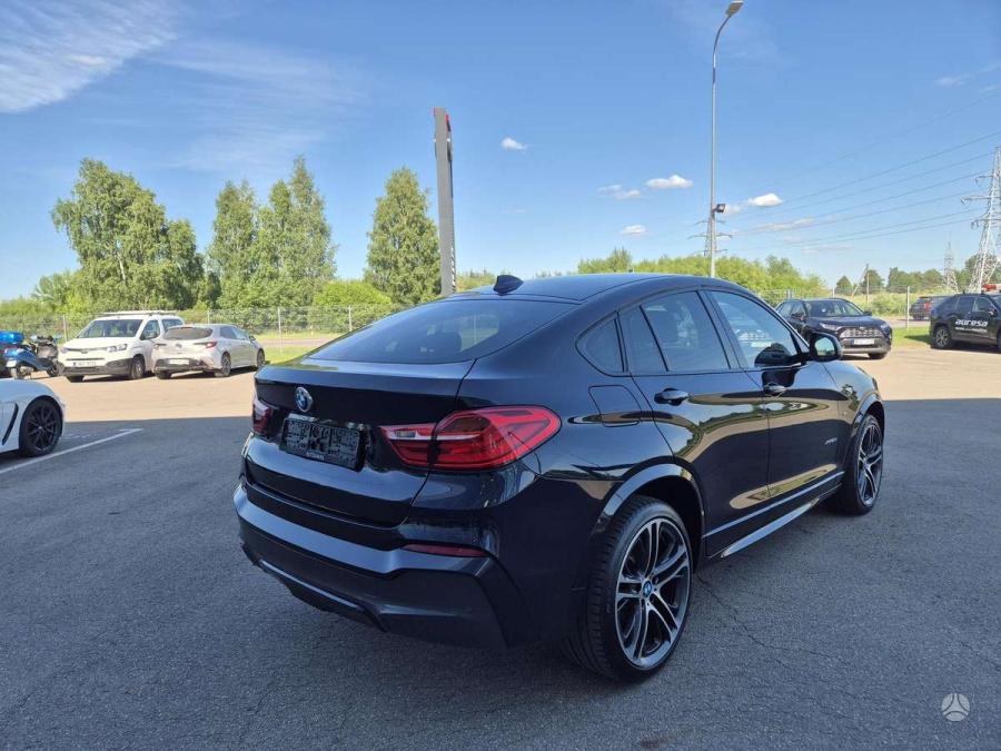 Black BMW X4 2015 in Panevezys, with an engine capacity of 2.00 L and mileage of 401 thousand km for 12650 €, photo 6 on AUTOMOTO.COM.LV