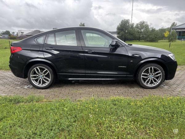 Black BMW X4 2015 in Taurage, with an engine capacity of 2.00 L and mileage of 258 thousand km for 15900 €, photo 6 on AUTOMOTO.COM.LV