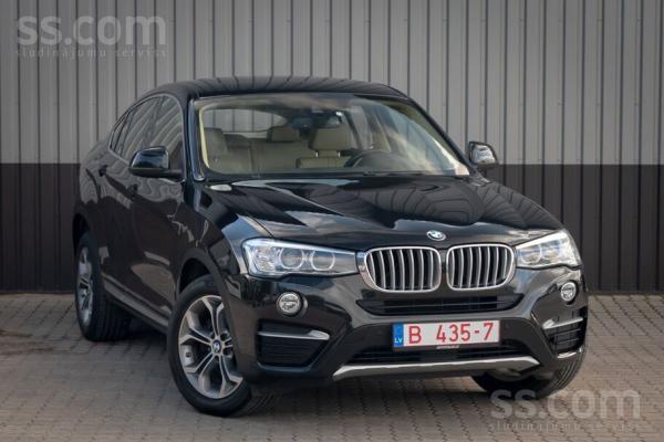 Black BMW X4 2015 in Talsi, with an engine capacity of 3.00 L and mileage of 226 thousand km for 15950 €, photo 1 on AUTOMOTO.COM.LV
