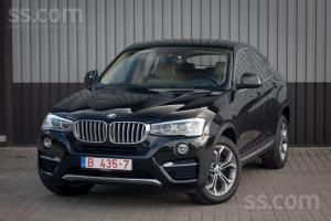 Black BMW X4 2015 in Talsi, with an engine capacity of 3.00 L and mileage of 226 thousand km for 15950 €, photo 4 on AUTOMOTO.COM.LV