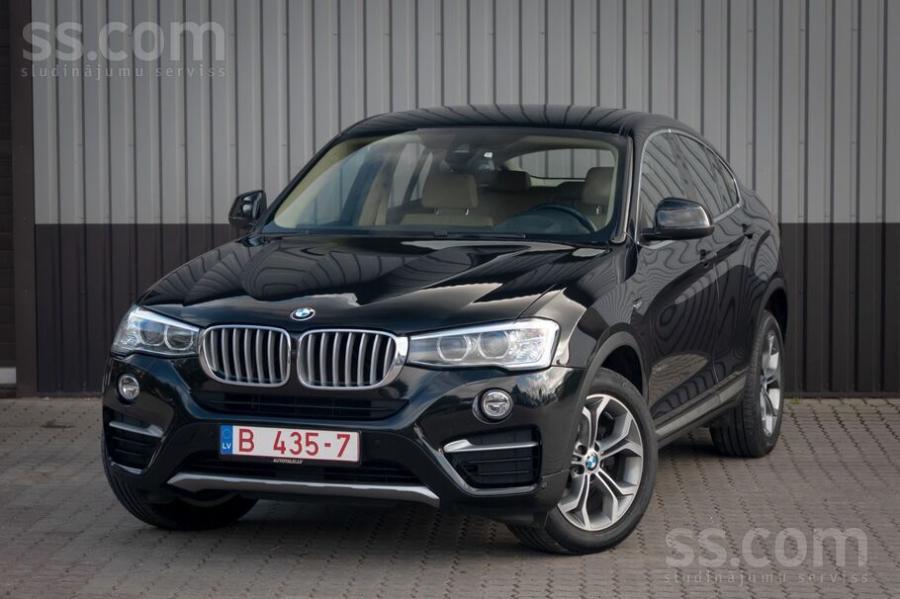 Black BMW X4 2015 in Talsi, with an engine capacity of 3.00 L and mileage of 226 thousand km for 15950 €, photo 4 on AUTOMOTO.COM.LV