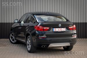 Black BMW X4 2015 in Talsi, with an engine capacity of 3.00 L and mileage of 226 thousand km for 15950 €, photo 5 on AUTOMOTO.COM.LV