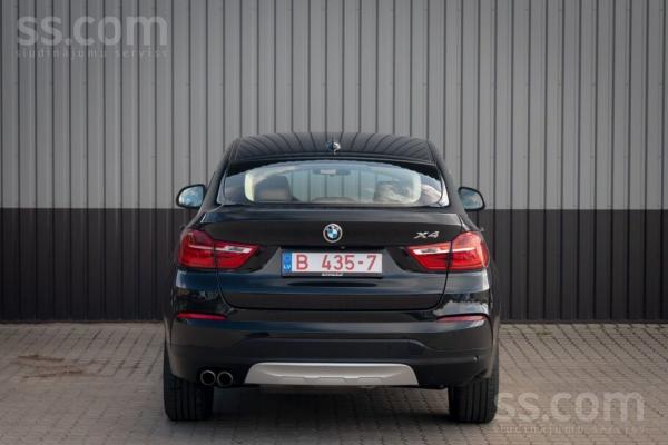 Black BMW X4 2015 in Talsi, with an engine capacity of 3.00 L and mileage of 226 thousand km for 15950 €, photo 5 on AUTOMOTO.COM.LV