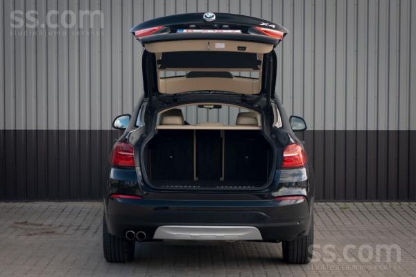 Black BMW X4 2015 in Talsi, with an engine capacity of 3.00 L and mileage of 226 thousand km for 15950 €, photo 6 on AUTOMOTO.COM.LV