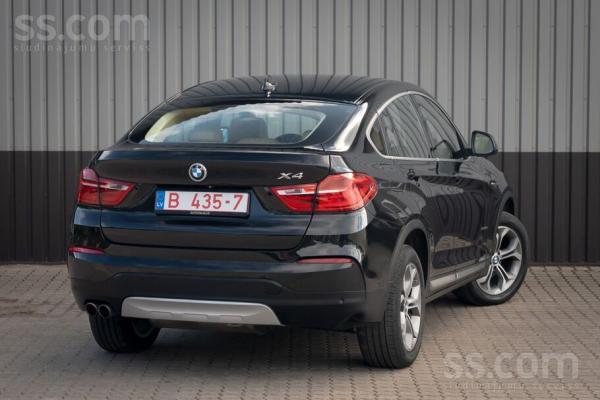 Black BMW X4 2015 in Talsi, with an engine capacity of 3.00 L and mileage of 226 thousand km for 15950 €, photo 7 on AUTOMOTO.COM.LV