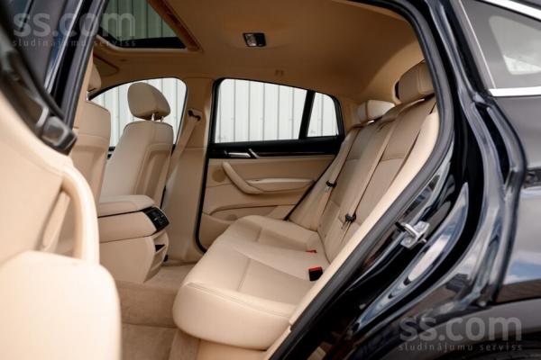 Black BMW X4 2015 in Talsi, with an engine capacity of 3.00 L and mileage of 226 thousand km for 15950 €, photo 10 on AUTOMOTO.COM.LV