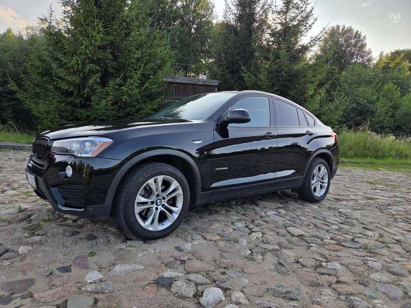 Black BMW X4 2015 in Telschi, with an engine capacity of 2.00 L and mileage of 236 thousand km for 15650 €, photo 6 on AUTOMOTO.COM.LV
