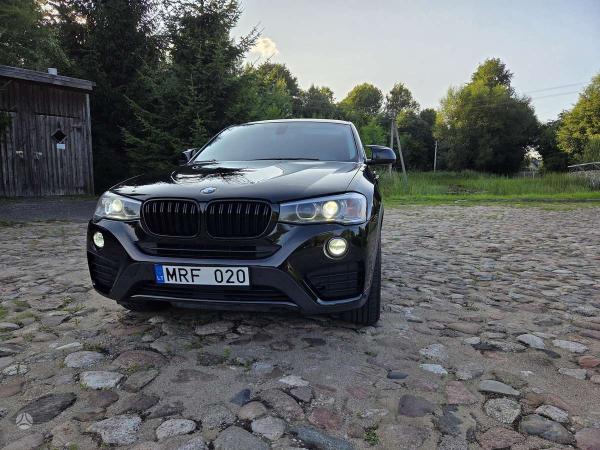 Black BMW X4 2015 in Telschi, with an engine capacity of 2.00 L and mileage of 236 thousand km for 15650 €, photo 10 on AUTOMOTO.COM.LV