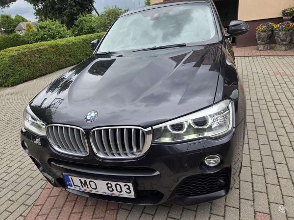 Black BMW X4 2015 in Pagegiai, with an engine capacity of 2.99 L and mileage of 150 thousand km for 17500 €, photo 7 on AUTOMOTO.COM.LV