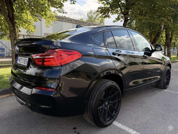 Black BMW X4 2015 in Kaunas, with an engine capacity of 2.99 L and mileage of 273 thousand km for 13500 €, photo 4 on AUTOMOTO.COM.LV