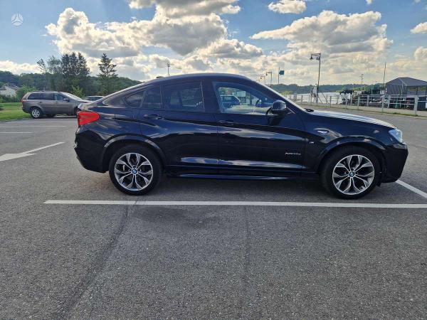 Black BMW X4 2015 in Kaunas, with an engine capacity of 2.99 L and mileage of 183 thousand km for 16400 €, photo 4 on AUTOMOTO.COM.LV