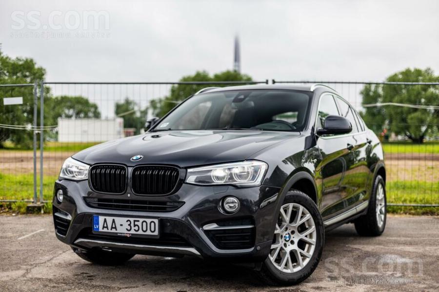 Black BMW X4 2016 in Riga, with an engine capacity of 3.00 L and mileage of 291 thousand km for 18990 €, photo 1 on AUTOMOTO.COM.LV