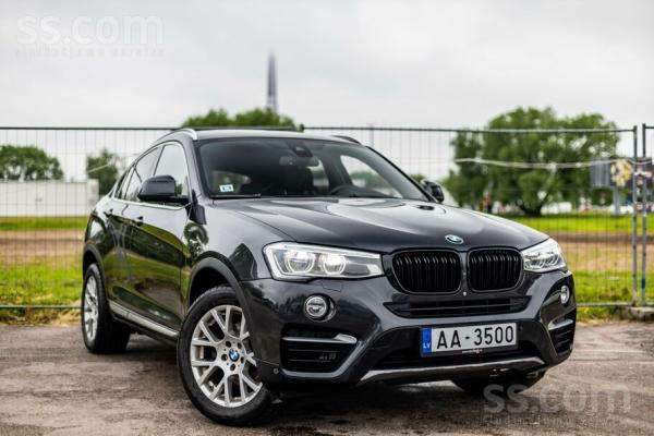 Black BMW X4 2016 in Riga, with an engine capacity of 3.00 L and mileage of 291 thousand km for 18990 €, photo 2 on AUTOMOTO.COM.LV