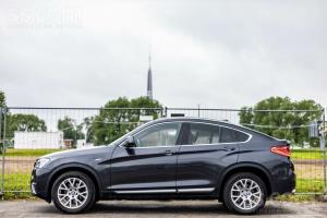 Black BMW X4 2016 in Riga, with an engine capacity of 3.00 L and mileage of 291 thousand km for 18990 €, photo 4 on AUTOMOTO.COM.LV